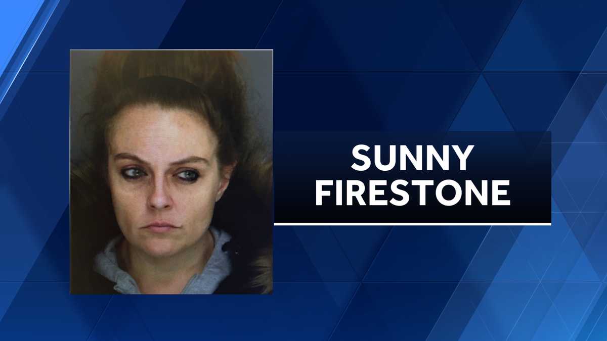 Woman accused of shoplifting during "shop with a cop" event