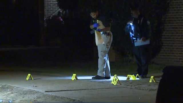 Two people, including security guard, shot at apartment complex