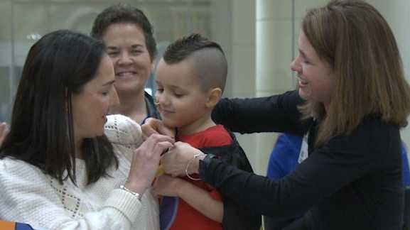 Little superhero gives big donation to Norton Children's Cancer Institute