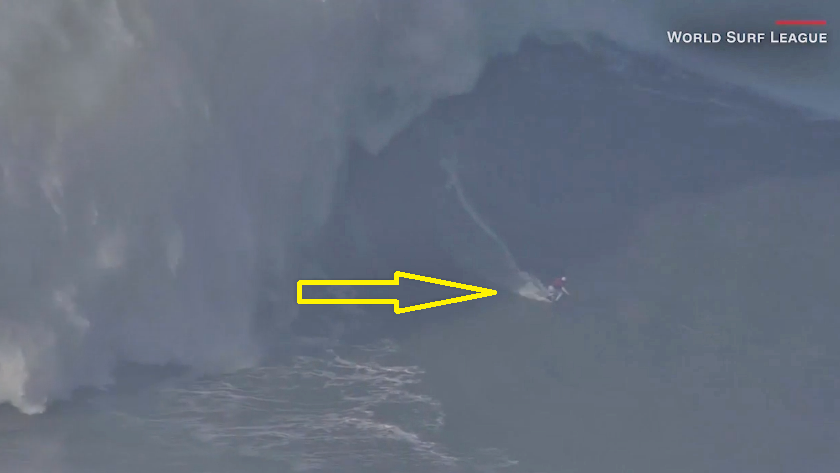 Woman surfs 68-foot monster wave to break world record