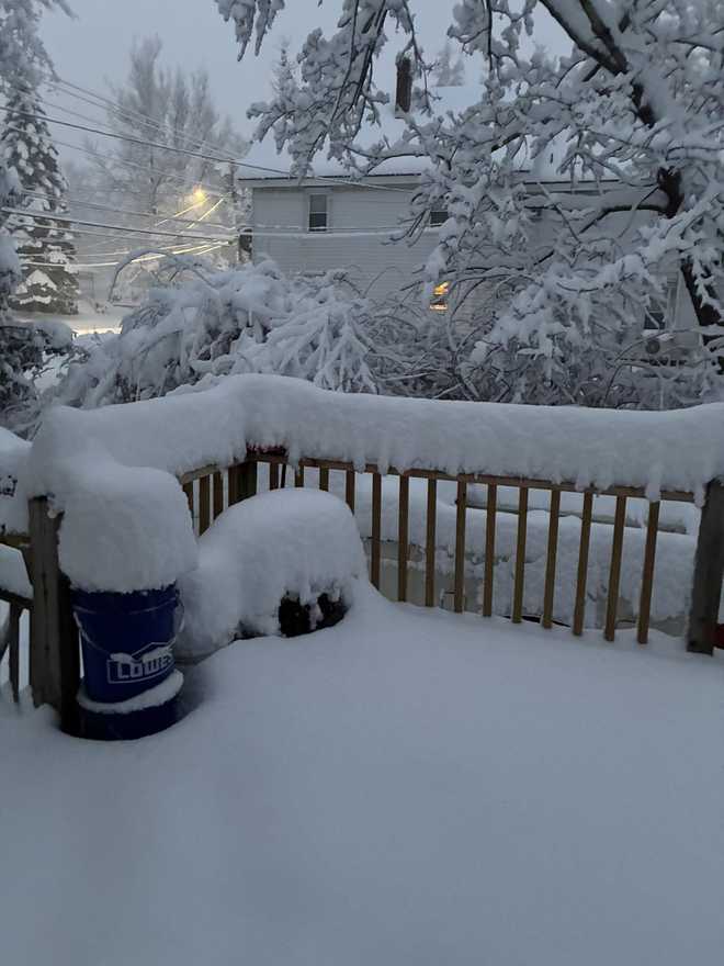 Christmas Eve day snowstorm dumps over a foot of snow