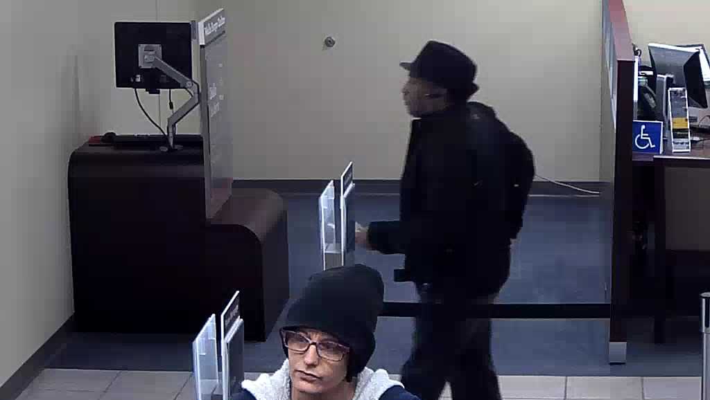 Police release photos of woman who robbed Wells Fargo bank