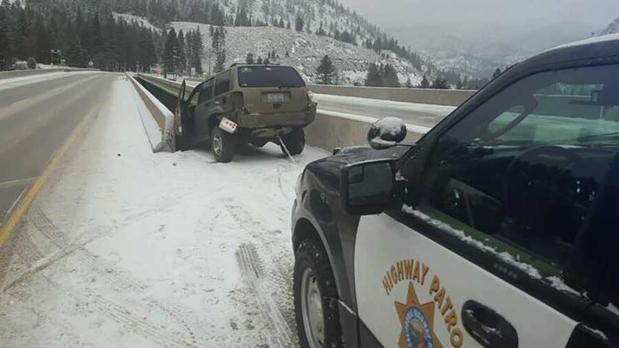 SUV pulled to safety after being stuck between 2 bridges