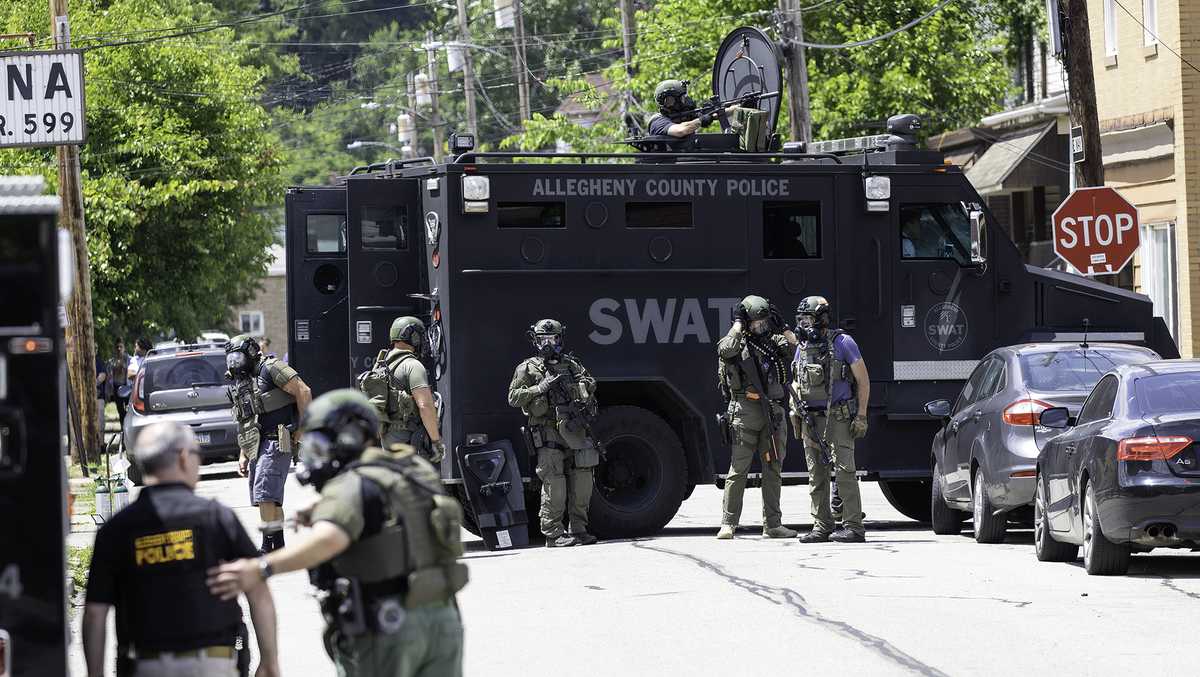 Man allegedly ran toward officers with knives during SWAT incident