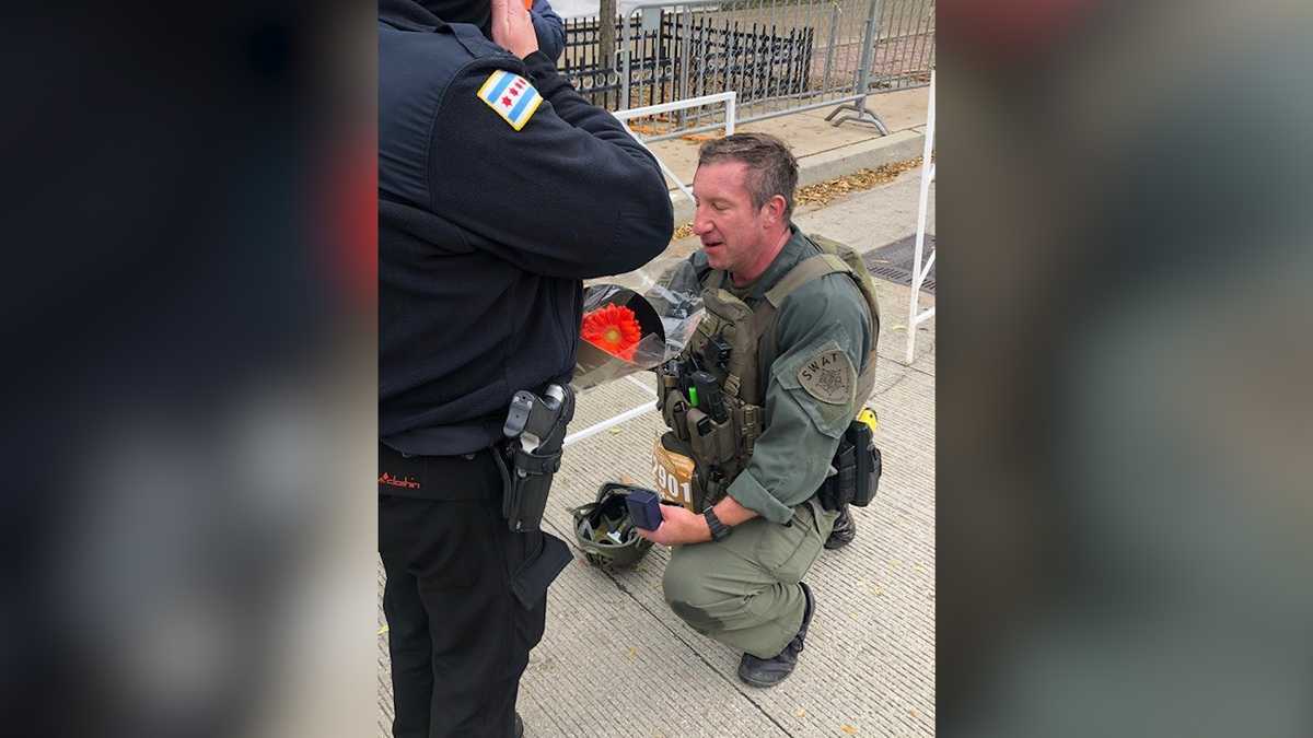 WATCH: Cop running race in full SWAT gear saves woman’s life, then ...