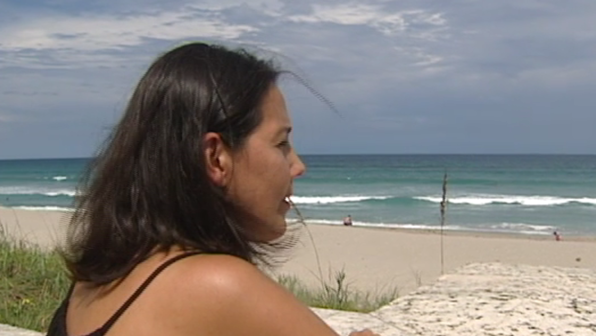 Teacher saves stranger in daring ocean rescue