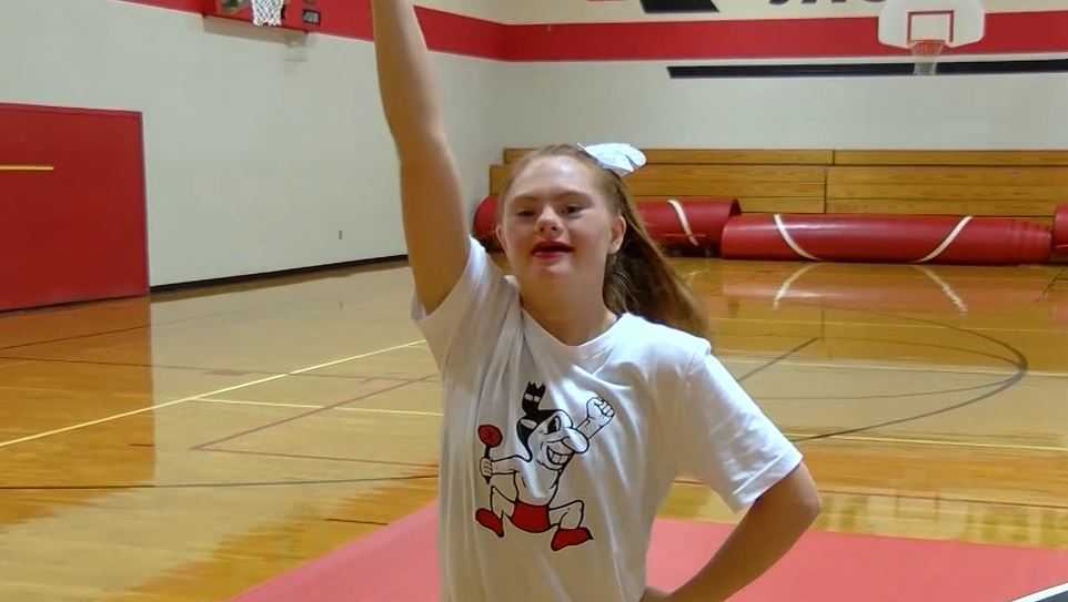 'Inspiring' teen with Down syndrome proves she belongs on cheer squad