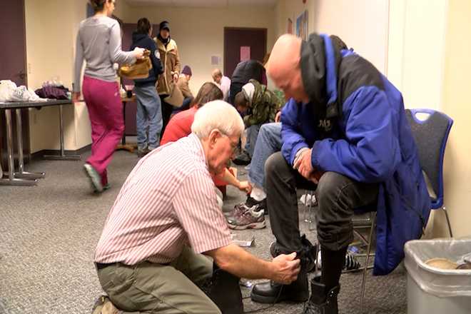 Homeless receive new shoes to stay healthy and warm