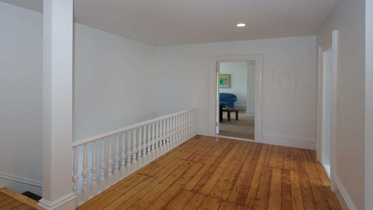 $4.25M Notable stucco colonial revival sits on most desirable street