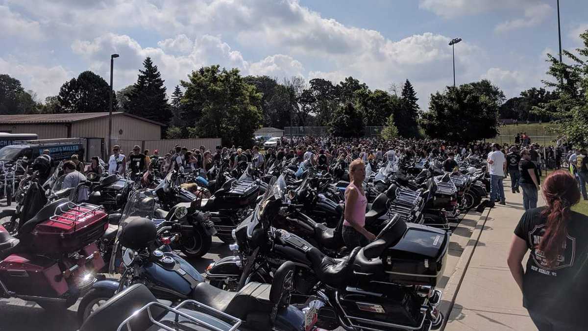 Hundreds of strangers turn out for Wisconsin boy's surprise birthday party