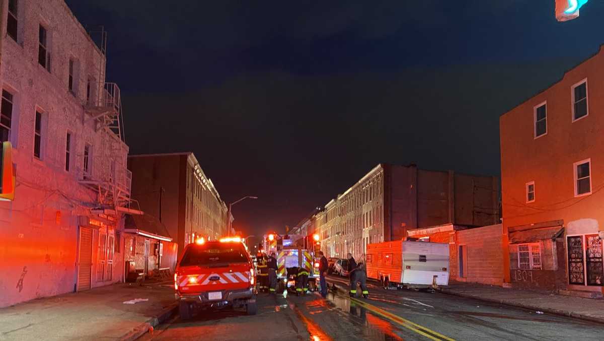 Vacant rowhome fire displaces nearly a dozen, one firefighter injured