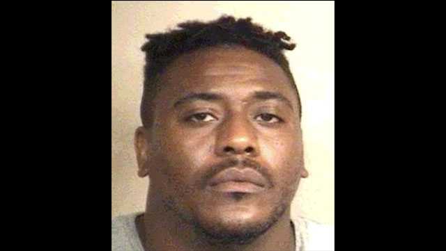 Man arrested year after double homicide