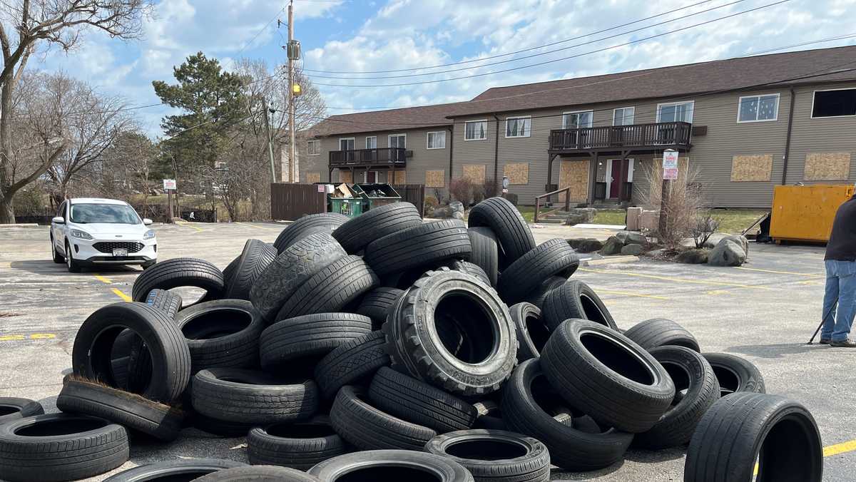 Illegal tire dump behind Milwaukee apartments finally cleaned up