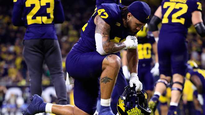 Multiple Mass. natives help Michigan football win national title