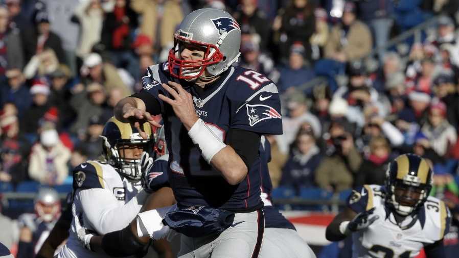 Patriots near another division title after beating Rams 26-10