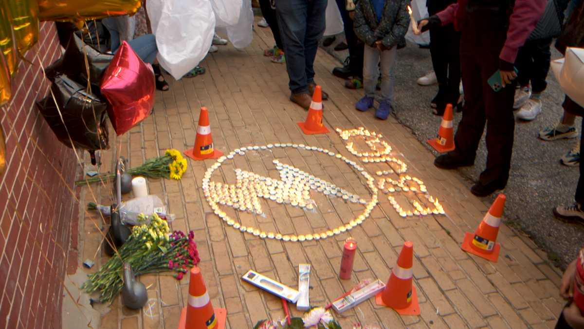 Family and friends hold vigil for boxer Ernest Hall