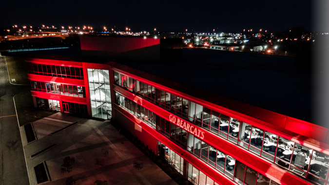 TQL headquarters lights up in red to support UC Bearcats