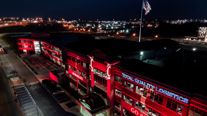 TQL headquarters lights up in red to support UC Bearcats