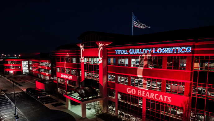 TQL headquarters lights up in red to support UC Bearcats