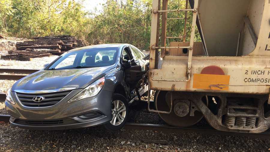 Car, train collide in Birmingham