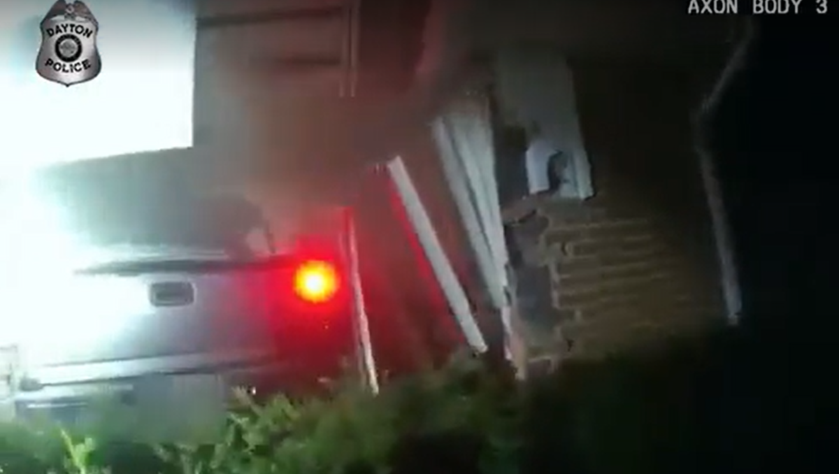 WATCH: Officers rush to rescue man after truck crashes into Dayton house