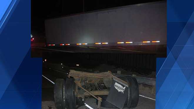 Suspected drunken wrong-way driver crashes into semi; rear wheels ...