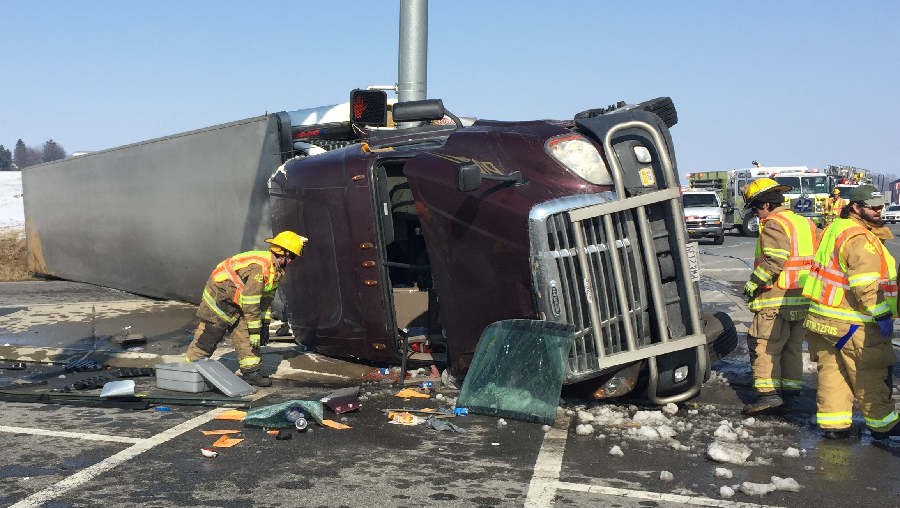 Update: Driver injured when tractor-trailer overturns