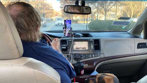Five-star 'Uber dog' keeps riders and autistic driver company