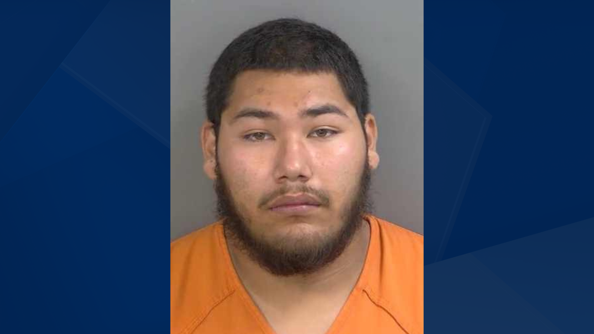 Man charged after three shot in Naples Manor