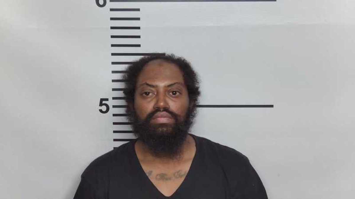 Dead body found in Russell tied, dragged behind SUV, says court docs