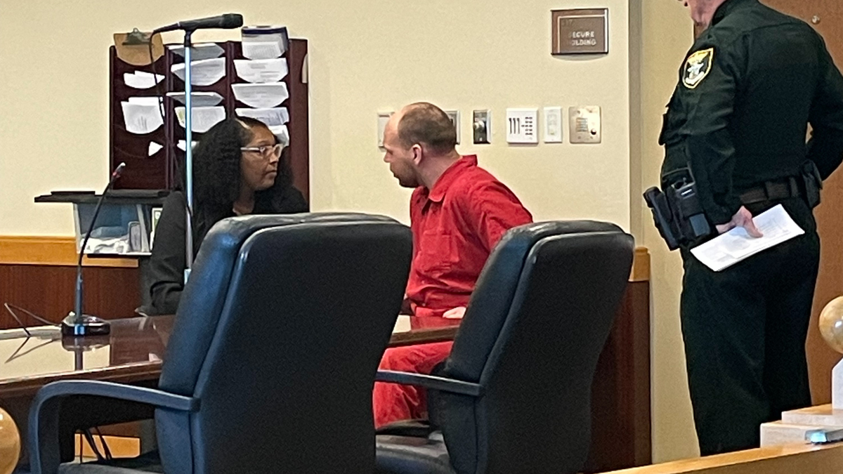 Christopher Davis pleads not guilty to murder of Barry Schmalbach