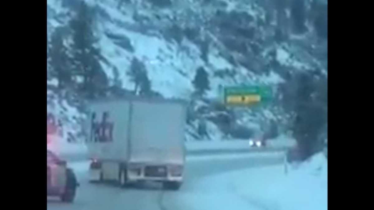 Watch a big rig slide to safety down an Interstate