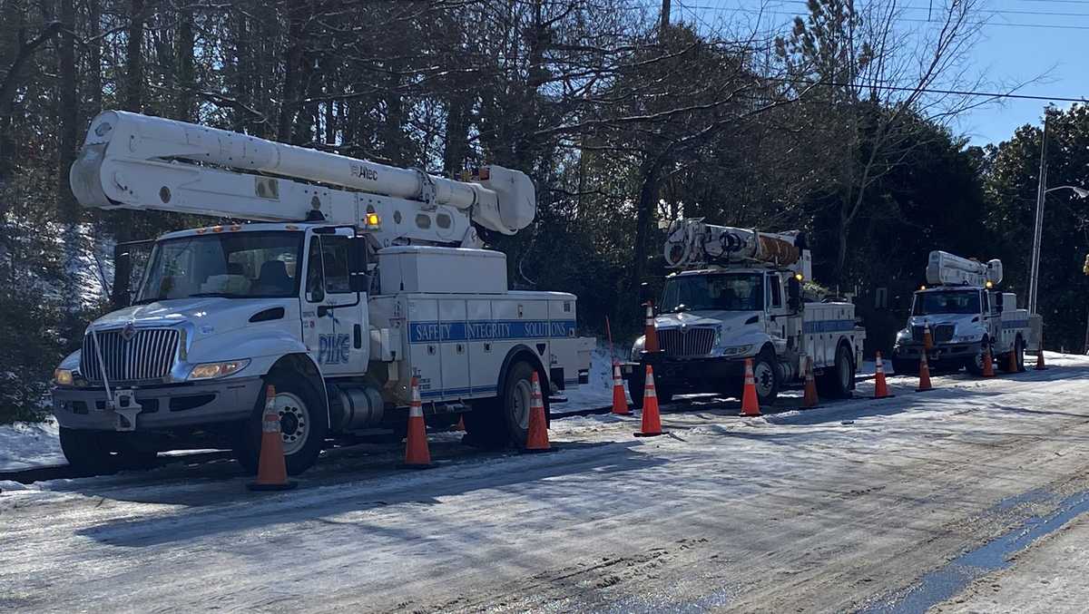 Utility crews work to restore power after winter storm