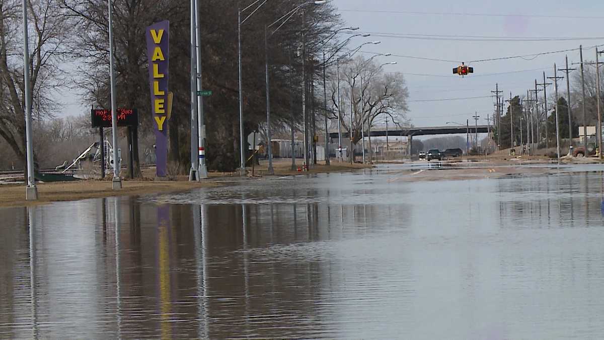 Flooding aftermath: damage to homes, roads