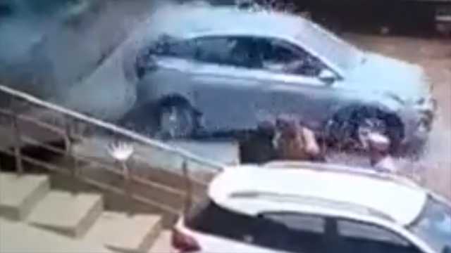 Driver crashes through glass at a dealership while trying new vehicle ...