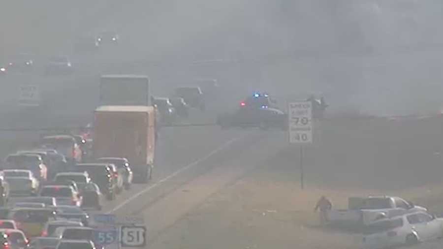 Car fire turns to grass fire along I-55