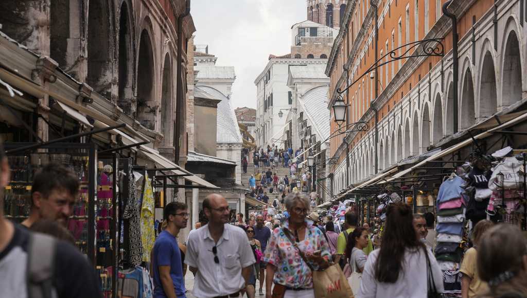 Venice rolls out day-tripper fee to try to regulate mass crowds