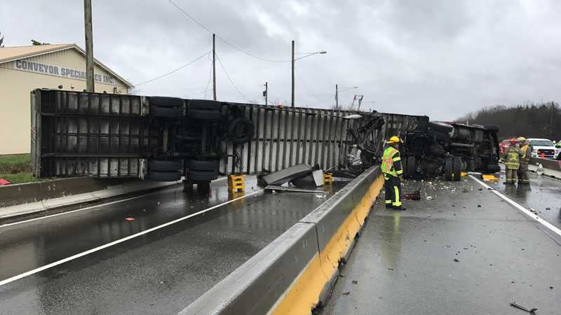 Photos: Tractor-trailer rollover crash closes Interstate 70