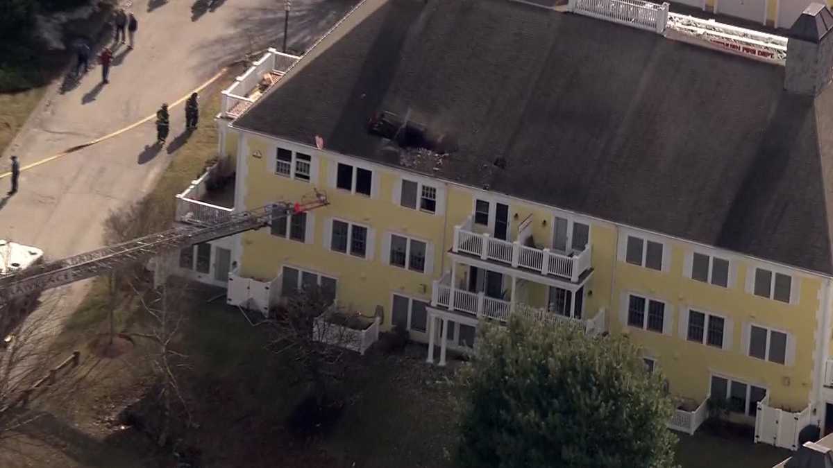 Plane crashes into condo building, killing pilot