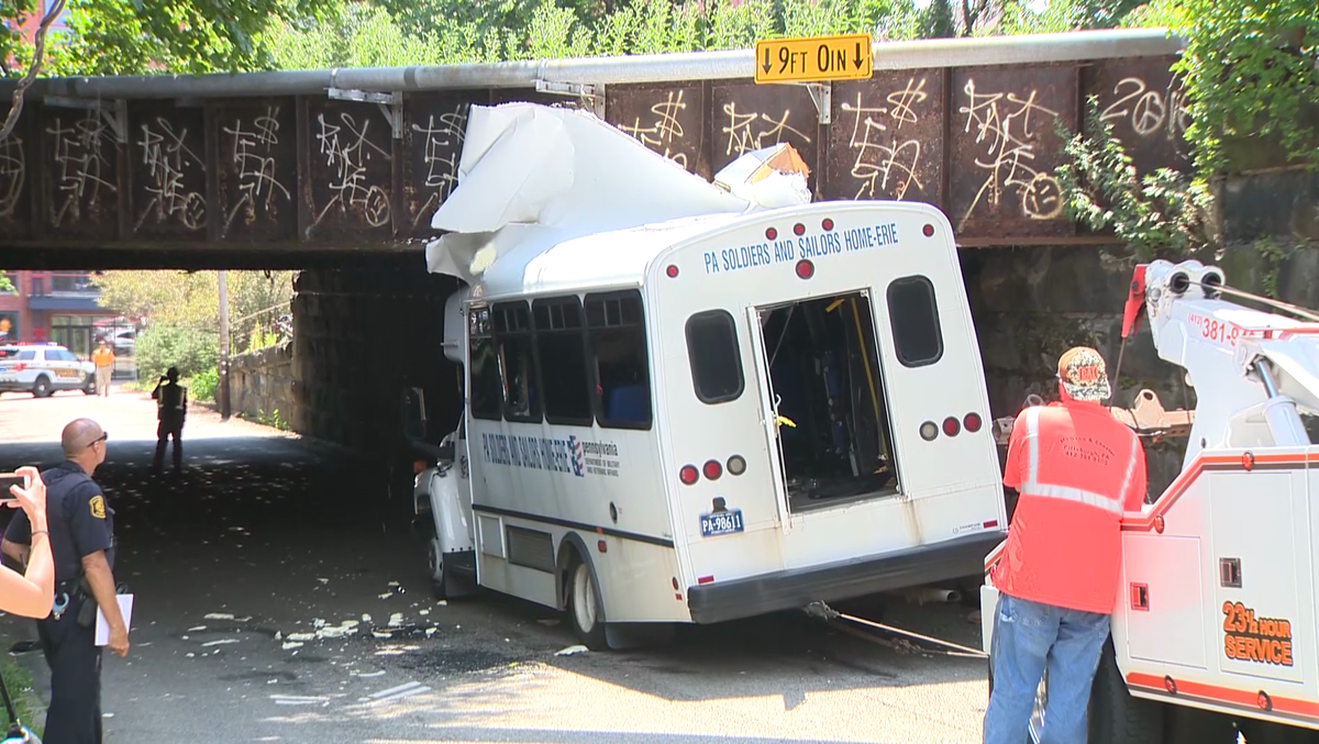 Veterans pulled from bus trapped under overpass on North Side