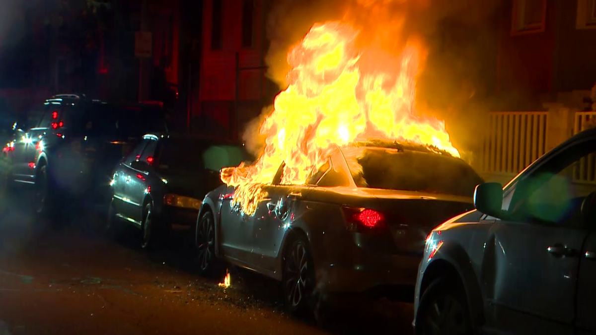 Flames engulf car on Boston street