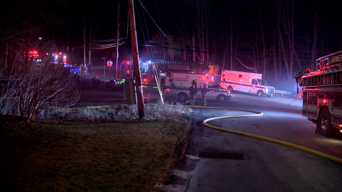 Two firefighters taken to hospital following garage fire in North ...