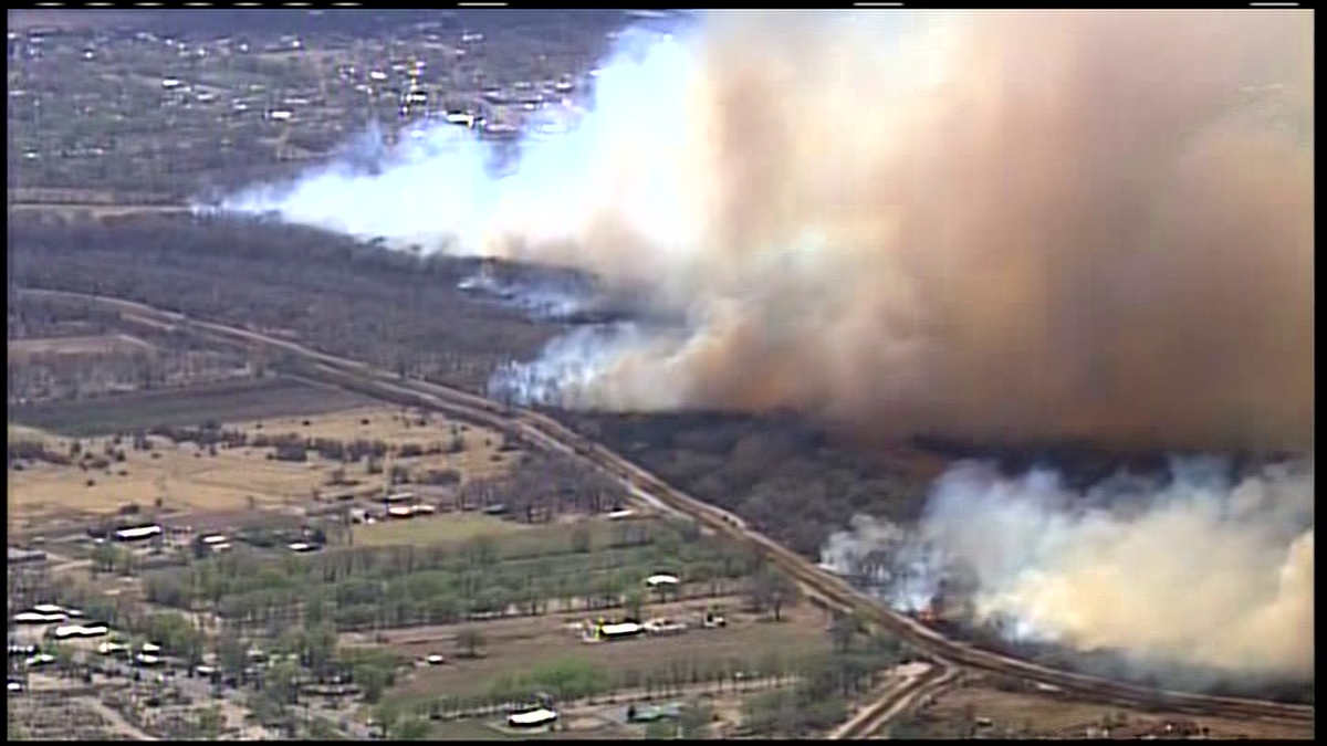 PHOTOS: Sky 7 flies over Valencia County bosque fire