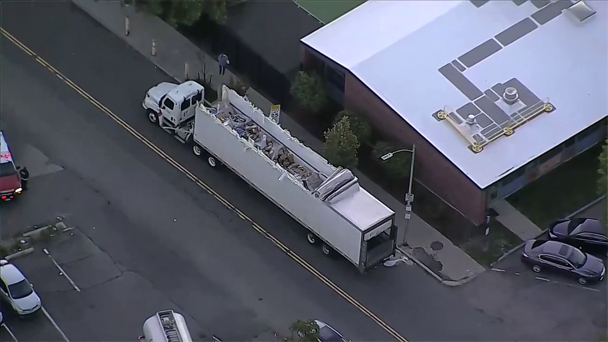 Truck has roof sheared off on Memorial Drive in Cambridge, Massachusetts