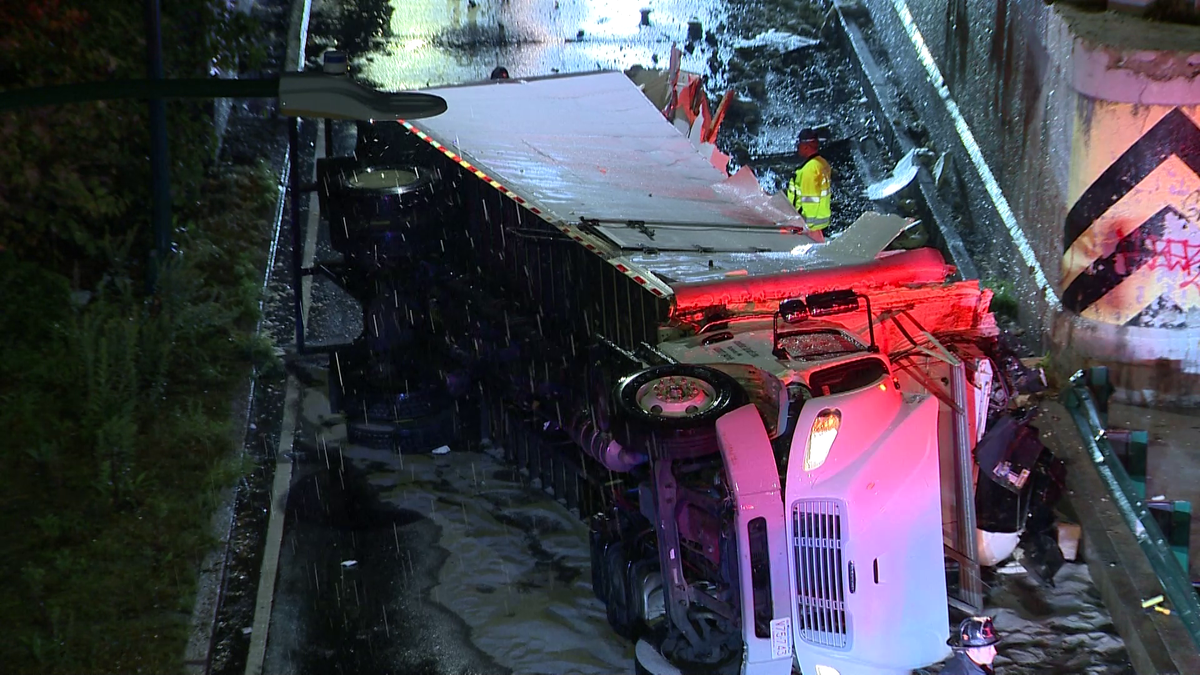 Truck rolls over after roof sheared off on Boston's Storrow Drive