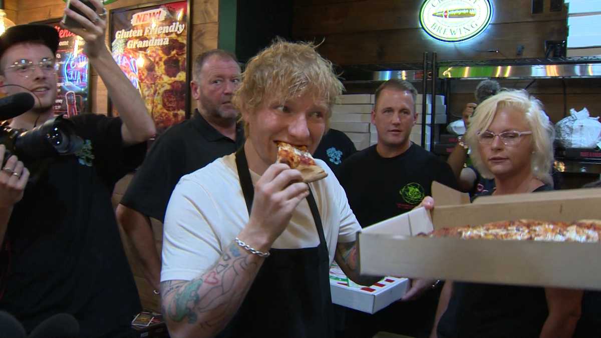Ed Sheeran visits Caliente Pizza to promote new hot sauce brand