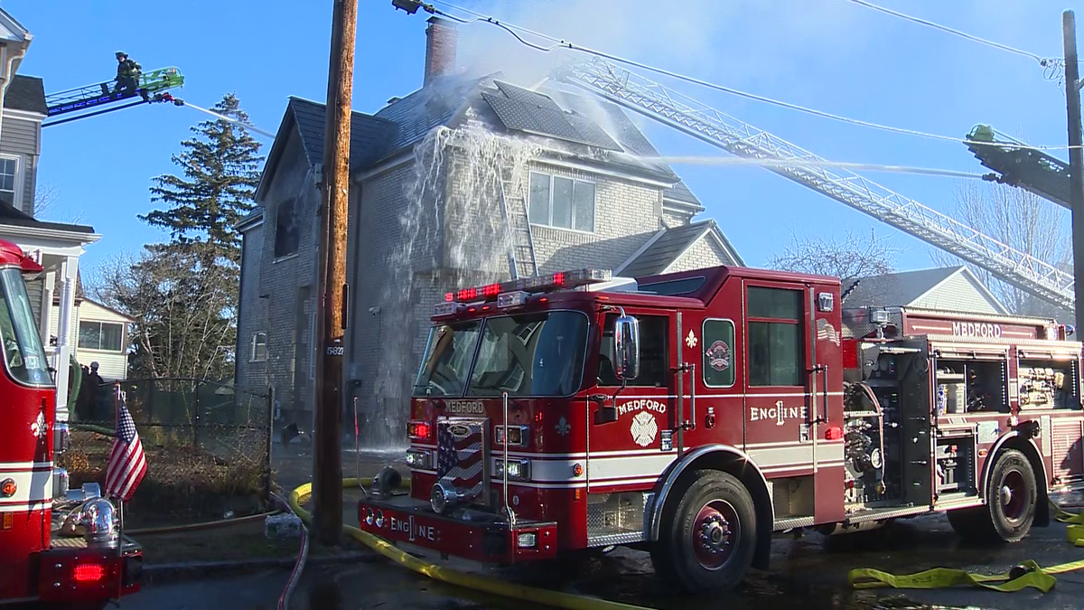 Crews battle fire in Medford