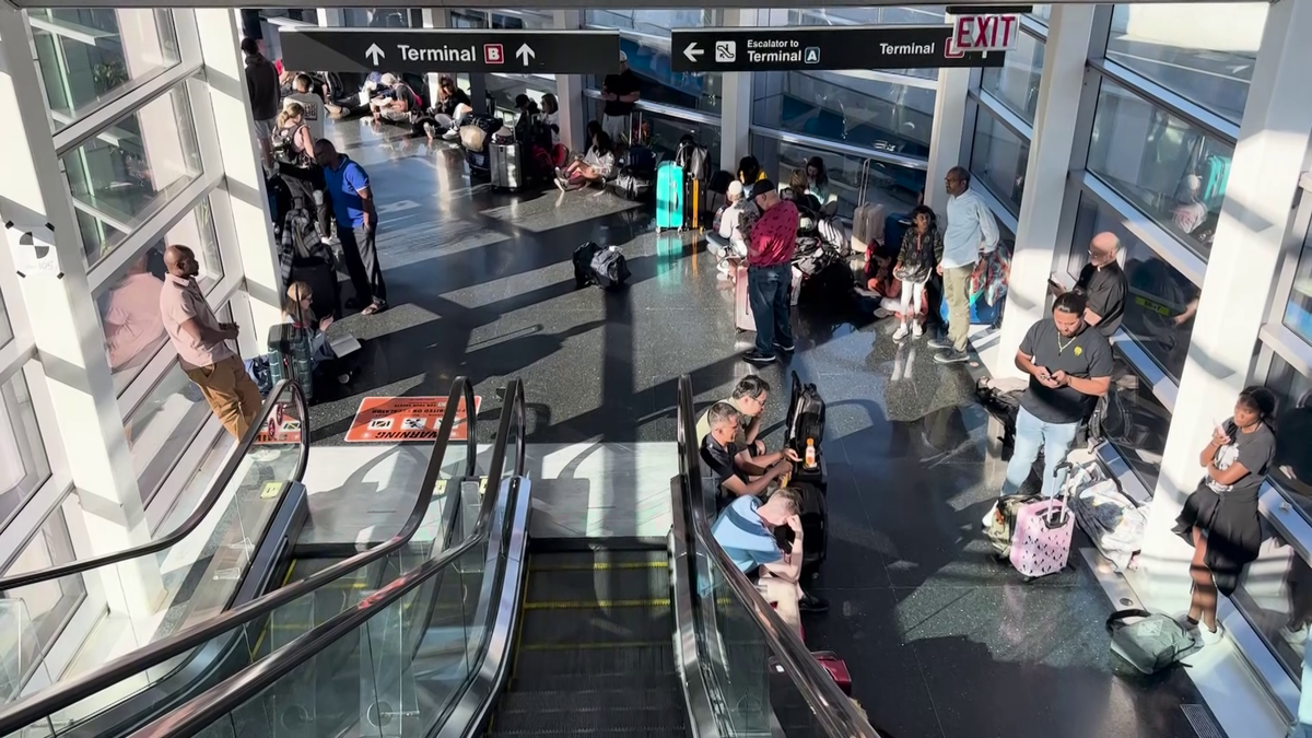 Hundreds of travelers left in limbo at Logan after technology outage