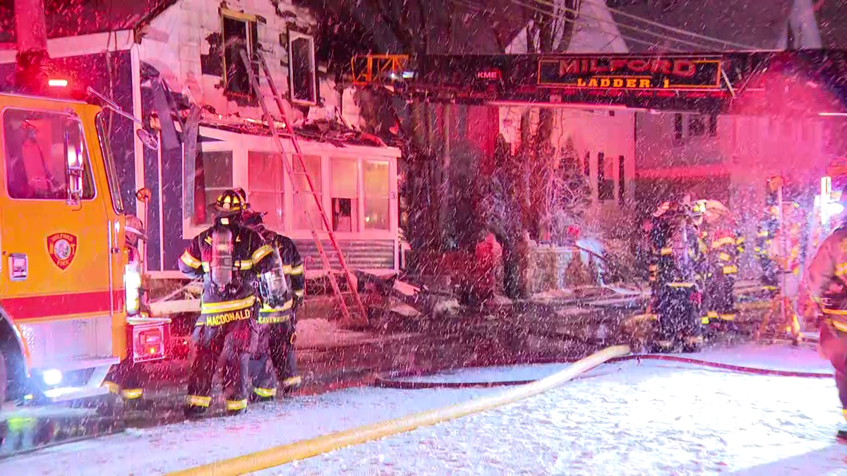 Crews battle overnight blaze, snowy conditions in Milford, Massachusetts