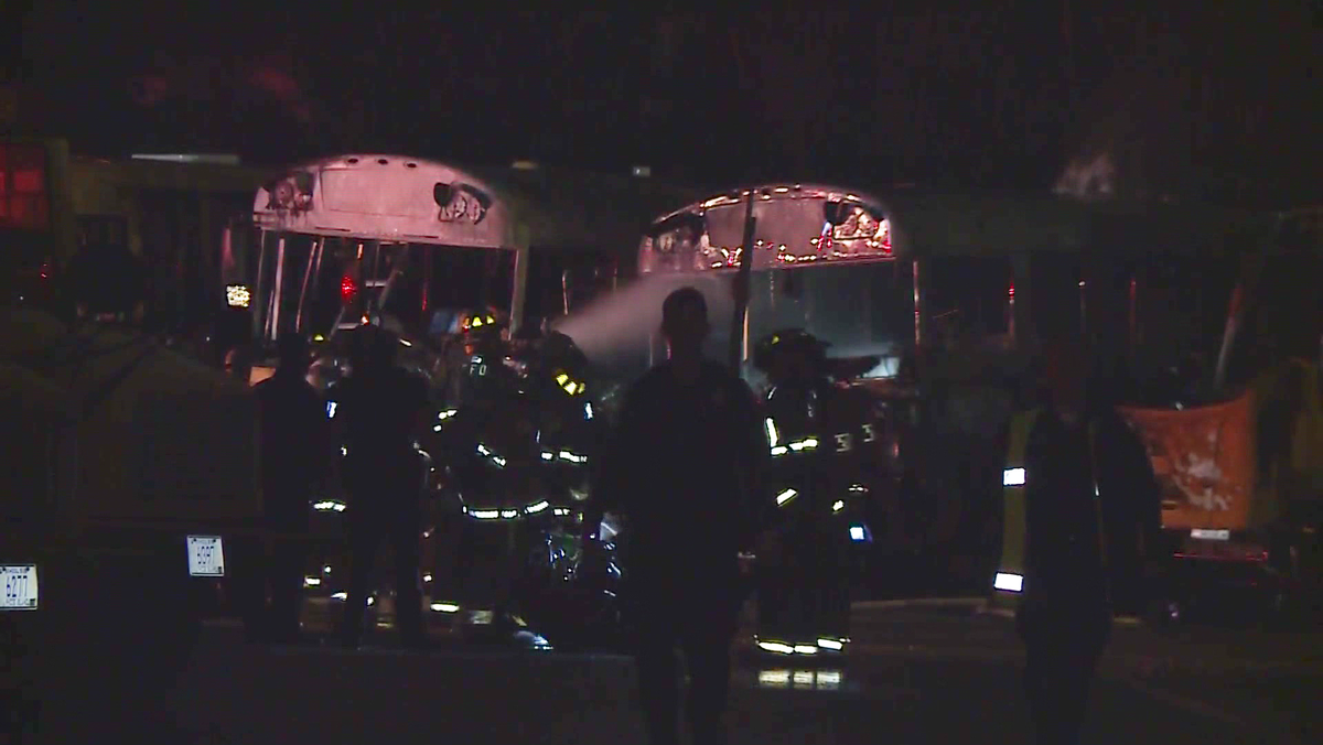 School buses damaged in fire in bus yard